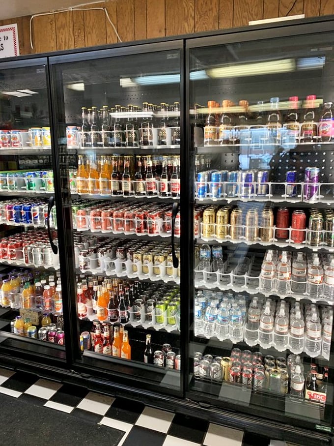 Cecil's beverage case: where decisions are tough and condensation is real. It's like a rainbow of refreshment options!