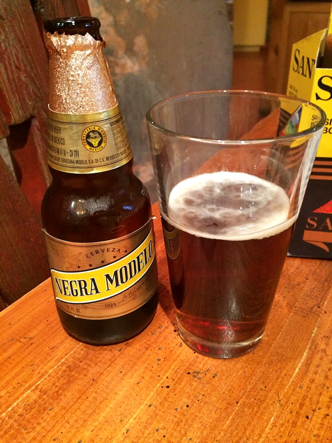 Cheers to good taste! Nothing washes down barbecue quite like an ice-cold Negra Modelo. It's like a fiesta in a bottle!