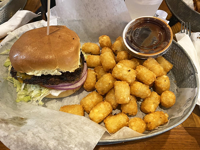 The "Big Bern" burger: Where beefy meets beautiful, and tots tag along for the tasty ride. It's a political party in your mouth!