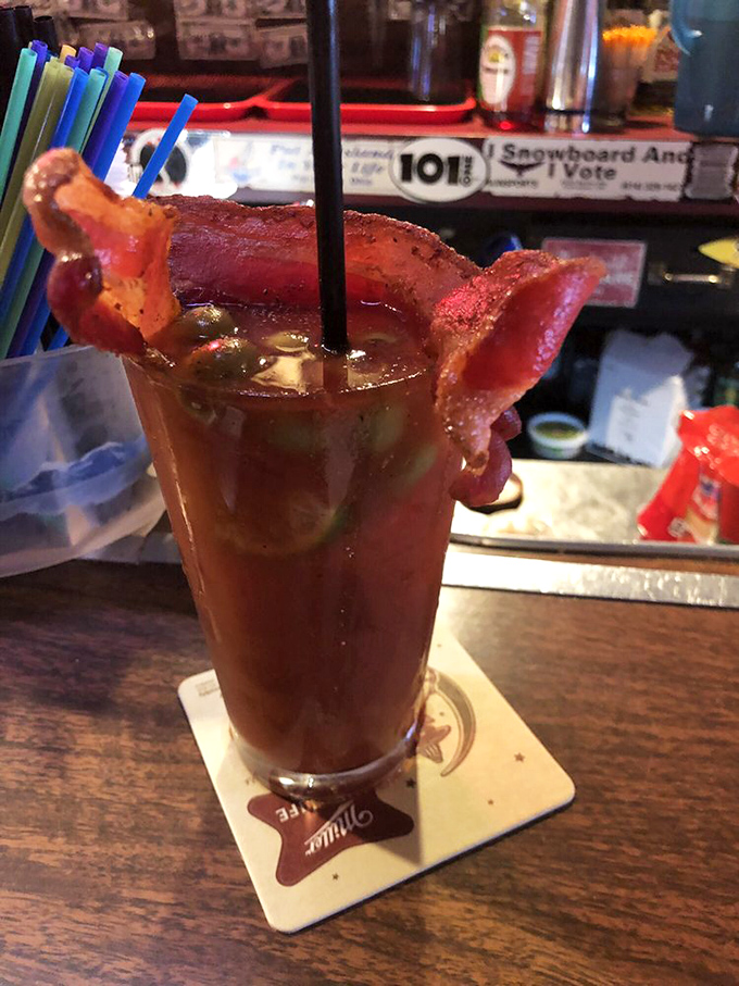 A Bloody Mary that eats like a meal! With bacon as a garnish, it's breakfast, lunch, and happy hour all in one glass.