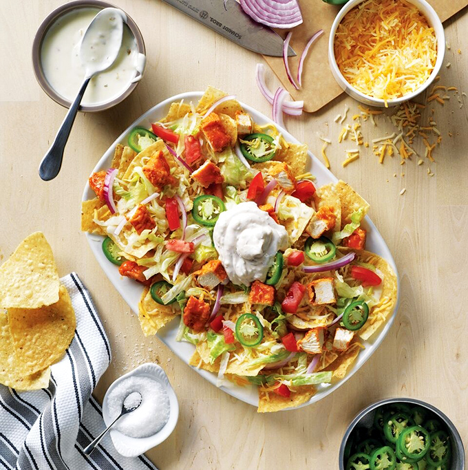 Buffalo chicken nachos that solve the age-old dilemma: "Do I want wings or nachos tonight?" The answer is gloriously both.