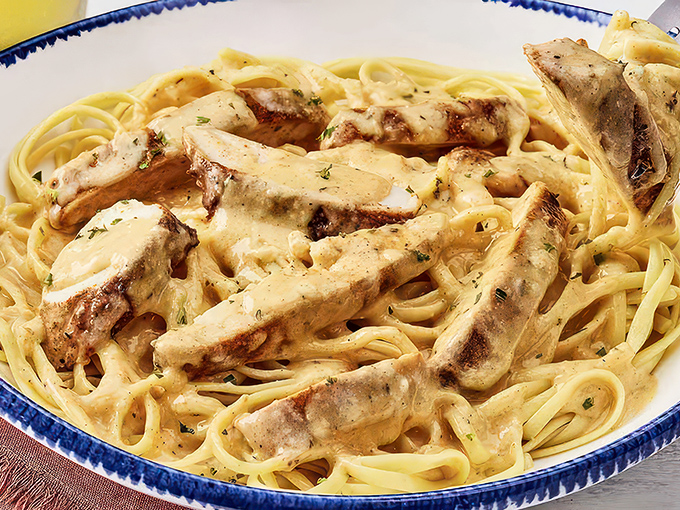 Pasta perfection with a Cajun kick! This linguini is like a New Orleans jazz band - smooth, soulful, and guaranteed to spice up your night.