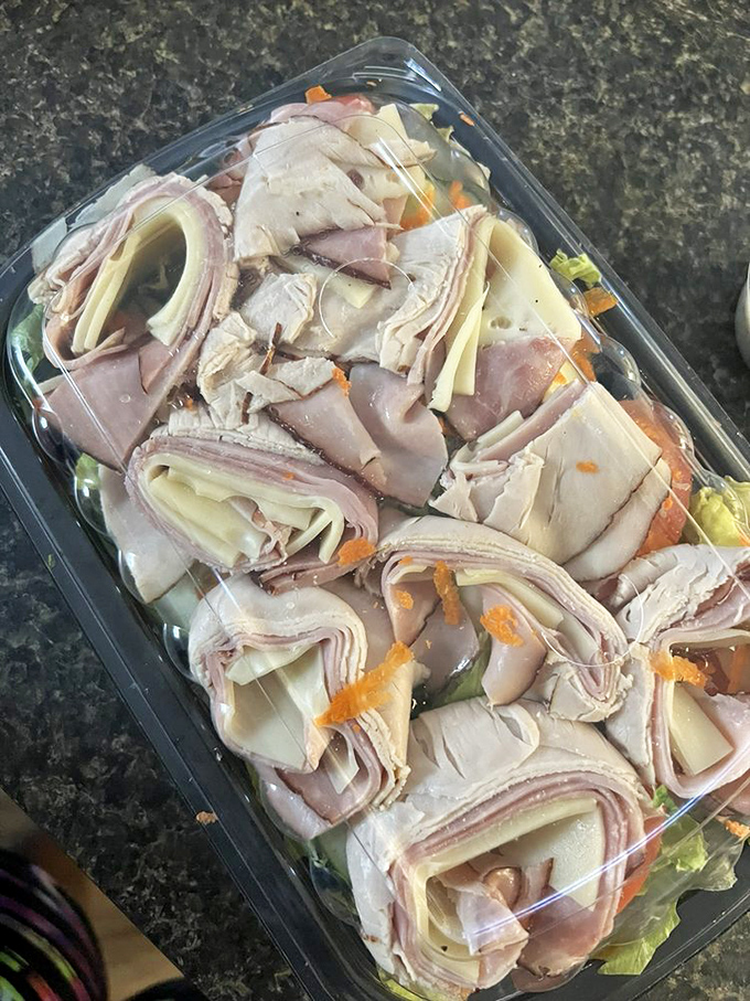 This isn't just a deli platter&mdash;it's a work of art where every pickle, meat slice, and dollop of coleslaw has found its perfect place.