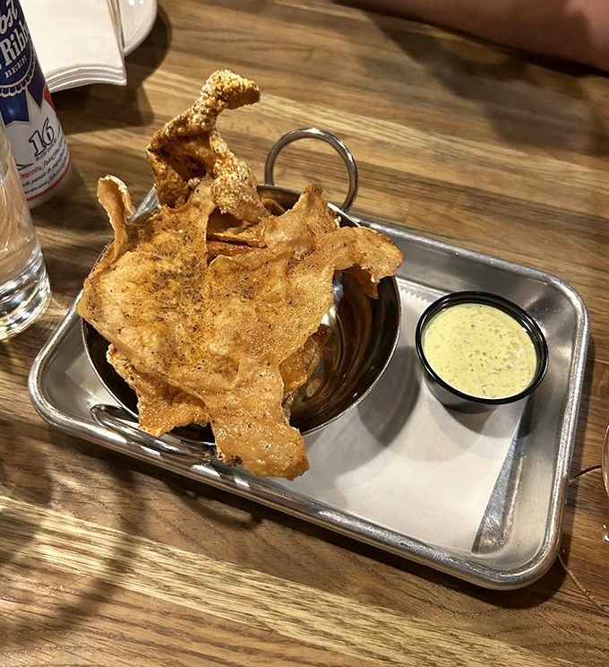 Crispy chicken skins: The guilty pleasure you didn't know you needed. It's like the best part of fried chicken decided to go solo.