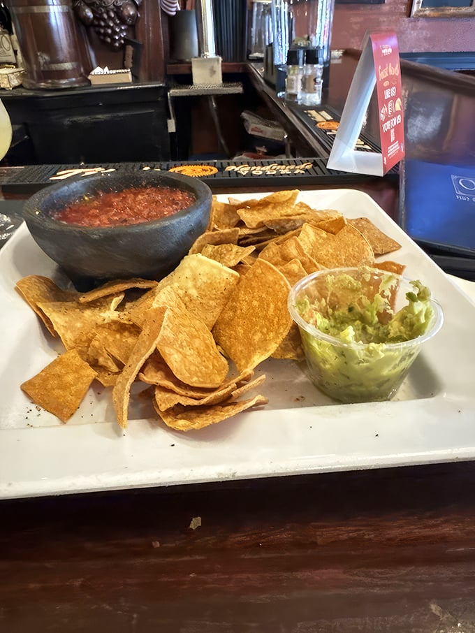 Classic bar nachos elevated to an art form&mdash;where the chip-to-dip ratio has been calculated with mathematical precision.