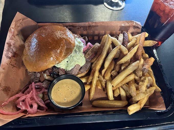 This chopped brisket sandwich isn't just a meal; it's a religious experience. Prepare for taste bud enlightenment!