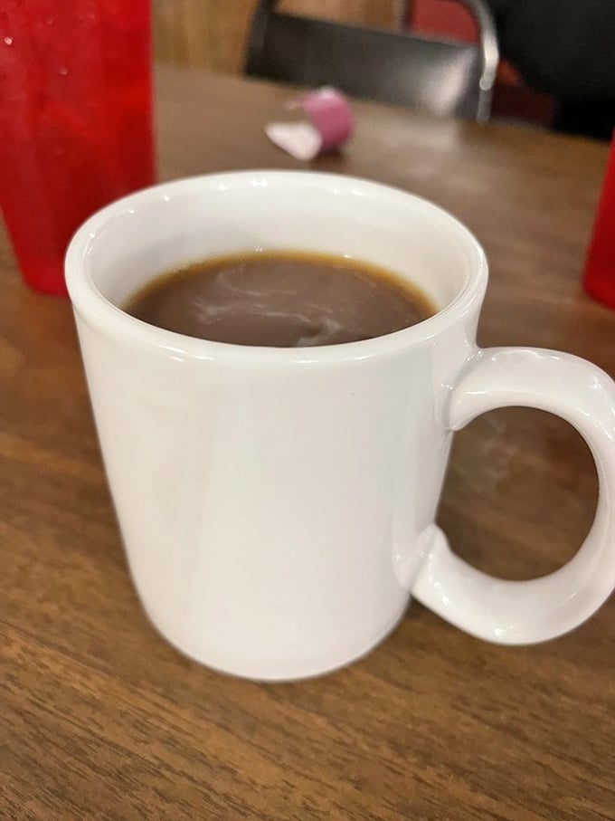 The elixir of life, Midwest-style. This cup of joe isn't just coffee; it's liquid motivation to face another Iowa winter. Or Monday. Same thing.