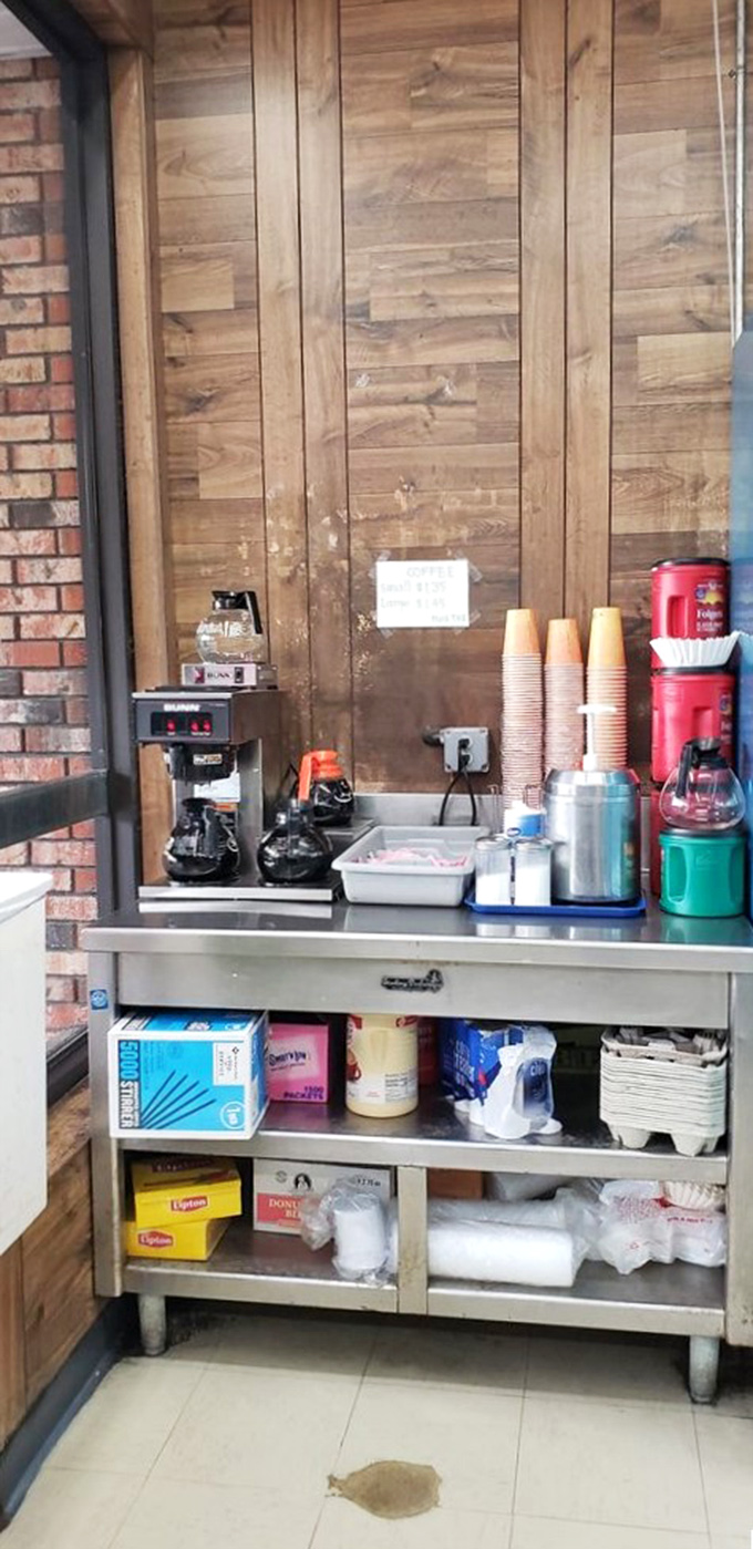 The unsung hero of any donut shop &ndash; the coffee station. Because even superheroes need their sidekicks, and donuts need their caffeinated companions.