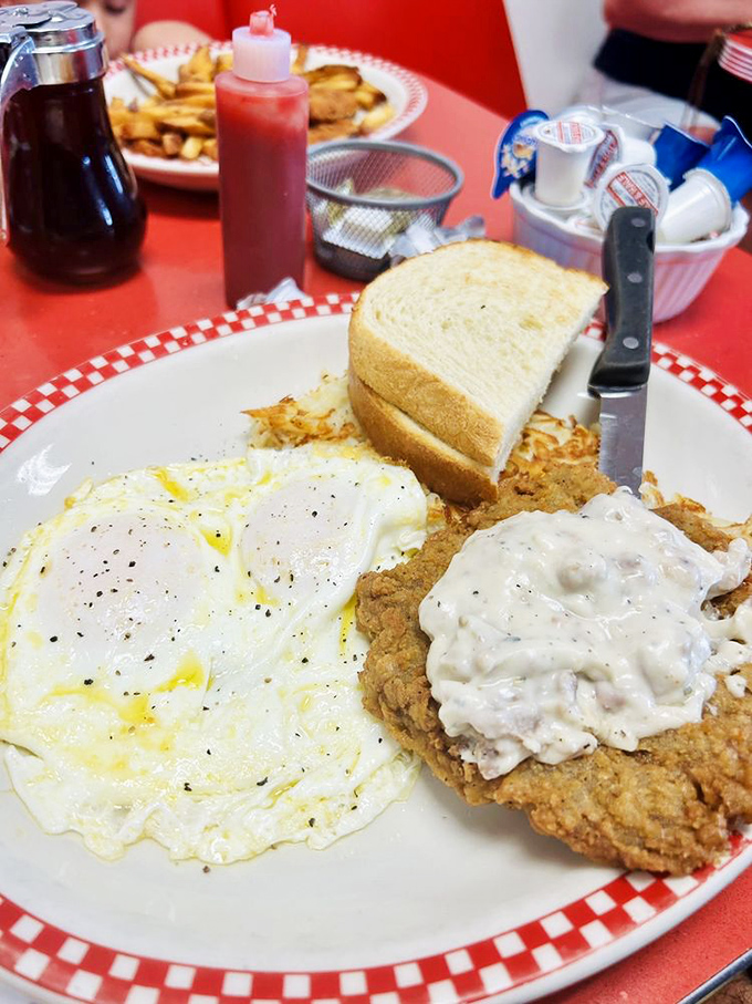 Country Fried Steak & Eggs: Where comfort food meets cardiac concern. It's a breakfast that would make your cardiologist wince and your taste buds sing.
