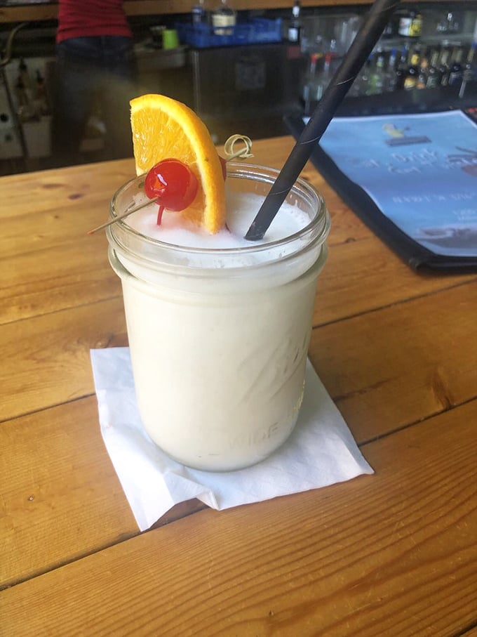 Is it a drink or a work of art? This creamy concoction, topped with a jaunty orange slice, is ready for its Instagram close-up.