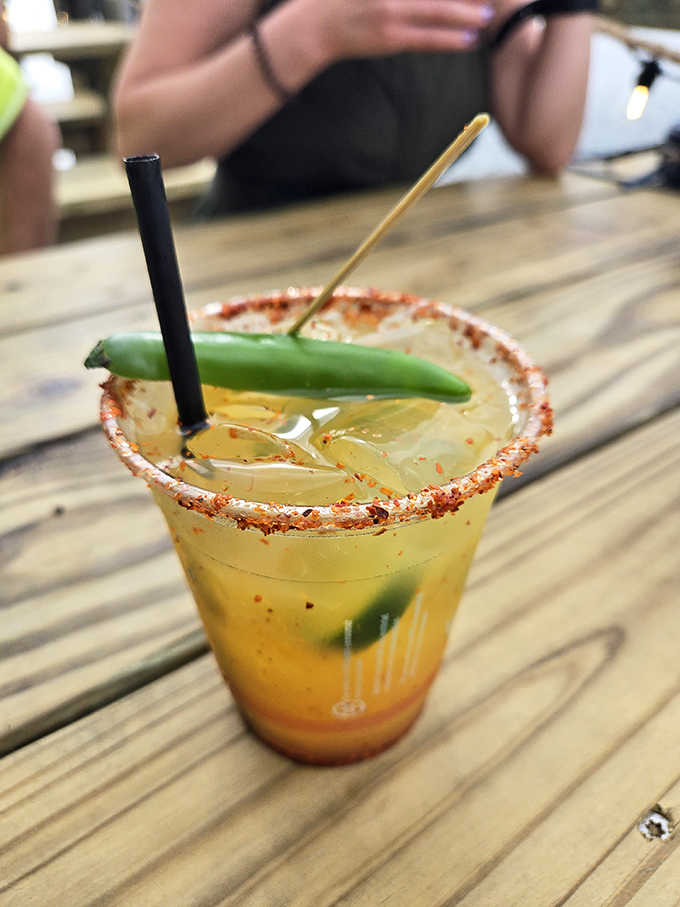 Spice up your life with Le Tub's zesty cocktail. This drink is like a beach party in a glass, complete with a jalape&ntilde;o kick.