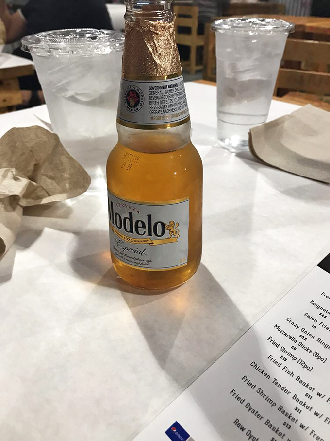 Cheers to good times and great food! This Modelo is the perfect sidekick for your seafood adventure &ndash; crisp, refreshing, and ready for action.