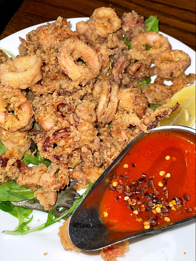 Crispy, golden rings of joy! This fried calamari is so good, you'll forget you're eating something with more legs than a centipede.