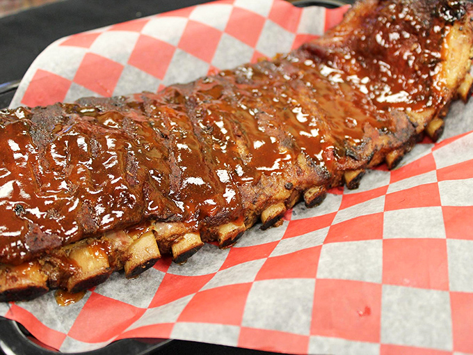 A full rack of ribs so glossy, you could use it as a mirror. But let's be honest, you'd rather use it as dinner.
