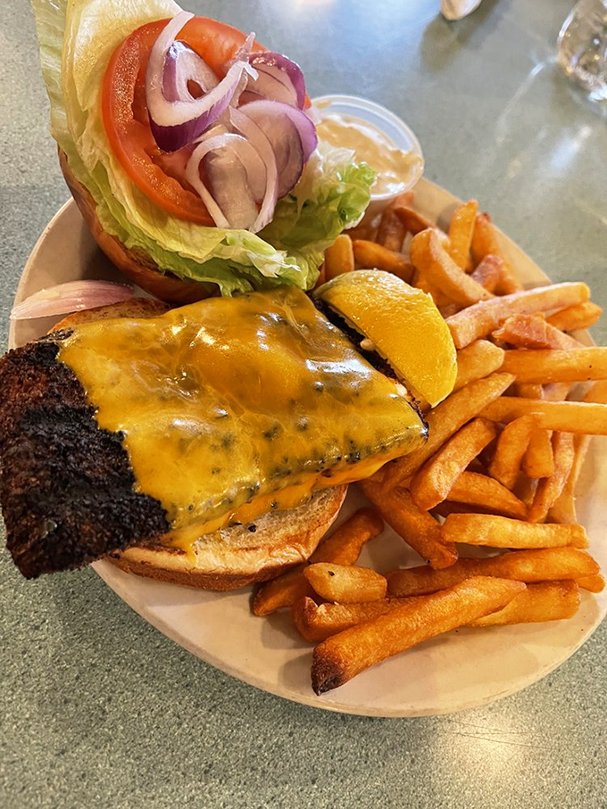 A burger that doesn't need fancy tricks or pretentious toppings&mdash;just honest flavor and enough cheese to make your cardiologist wince approvingly.