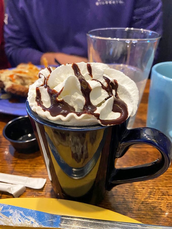 Hot chocolate or liquid happiness? This mug of pure indulgence, topped with a cloud of whipped cream, is the warm hug your soul didn't know it needed.