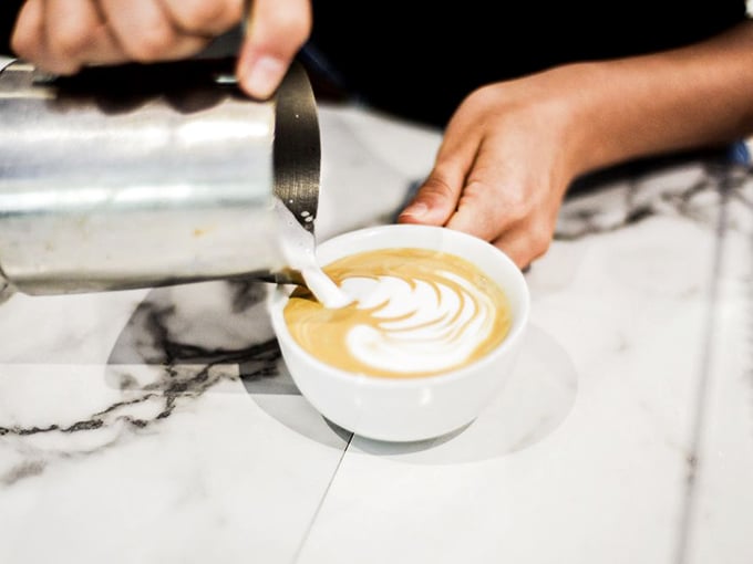 Latte art so pretty, you almost don't want to drink it. Almost. This cup of joe is ready for its coffee table book close-up.