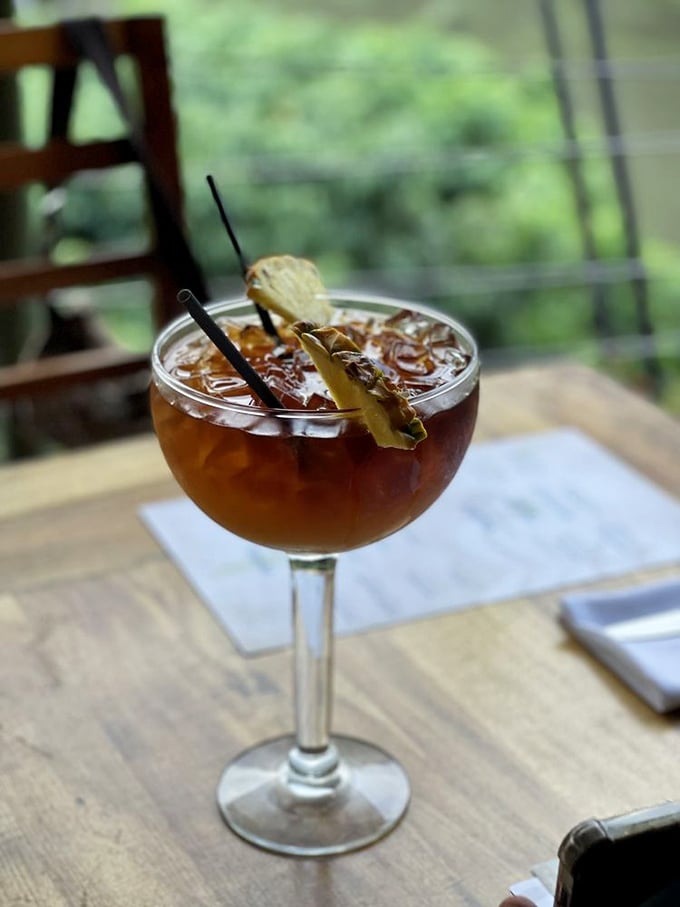 Liquid sunshine in a glass! This Mai Tai isn't just a drink; it's a tropical vacation for your taste buds. Don't forget your tiny umbrella passport!