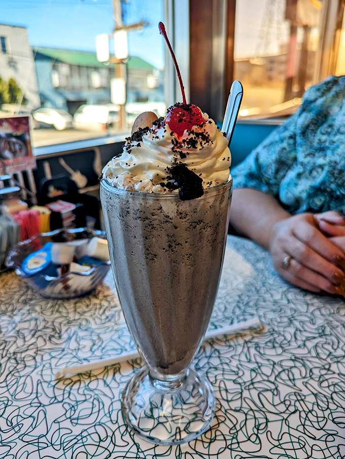Holy cow! This milkshake's so thick, it's got its own zip code. Straws need not apply - you'll want a spoon for this bad boy.