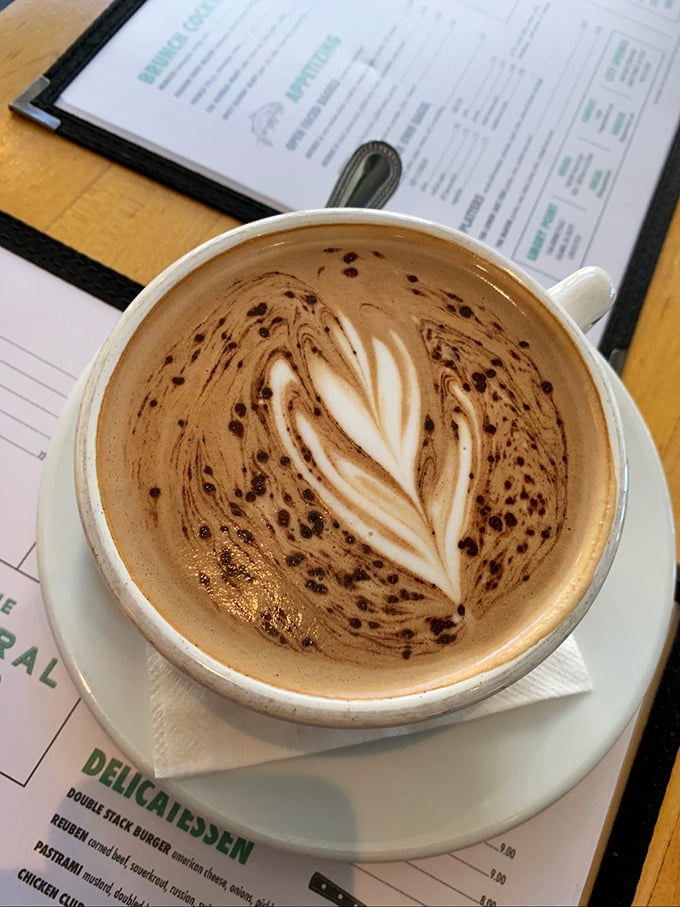 Coffee art or caffeinated Picasso? This mocha latte is almost too pretty to drink&hellip; almost.