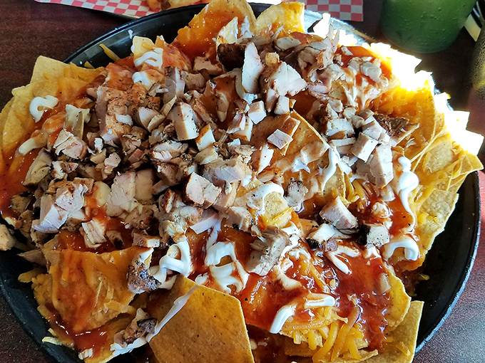 BBQ nachos that solve the age-old dilemma of choosing between Tex-Mex and barbecue. The answer is clearly "both," and it's glorious.