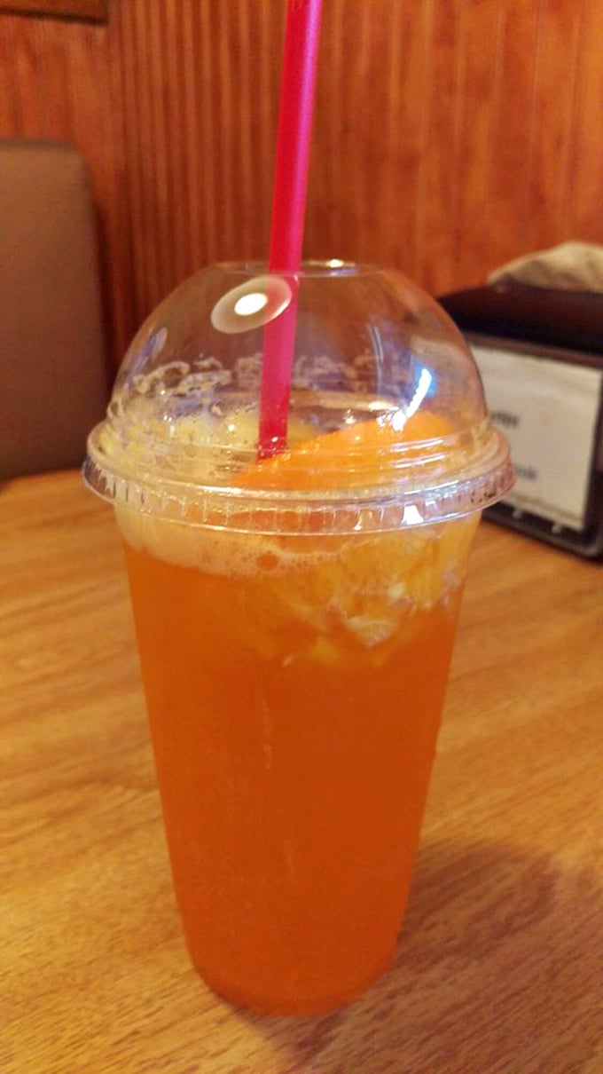Sunshine in a cup! This orange spritzer is like a mini vacation for your mouth – no sunscreen required.