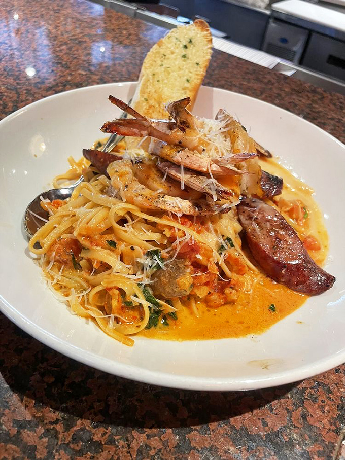 Pasta Mardi Gras: where noodles go to party! This dish is so colorful, it could double as a float in a Cajun carnival parade.