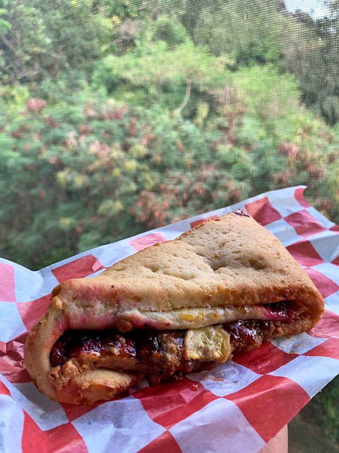 Peanut butter jelly time just got a tropical makeover! This sandwich looks like it could turn even the gloomiest day into a luau for your taste buds.