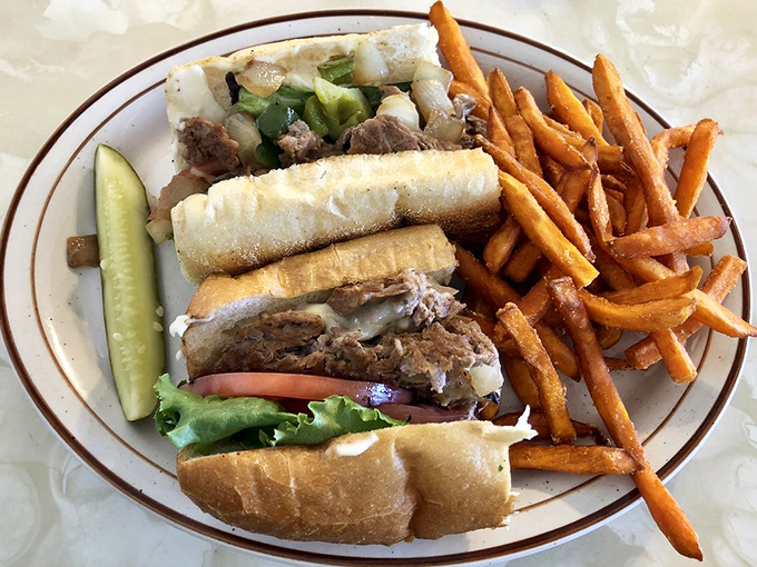 Philly, meet Virginia! This cheesesteak is a cross-country flavor explosion. Tender meat, gooey cheese, and a side of crispy fries &ndash; it's a match made in diner heaven.