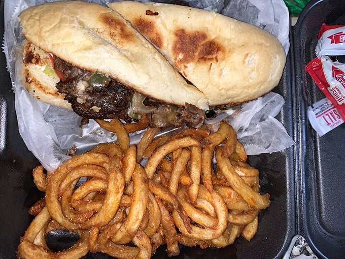 A Philly cheesesteak that would make a Pennsylvanian nod in approval, paired with curly fries that put the "happy" in happy meal.