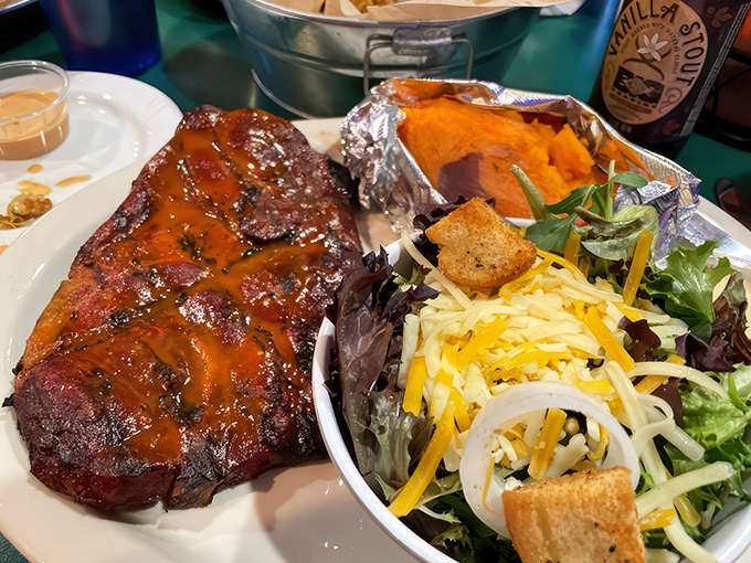 Who needs a red carpet when you've got this star-studded plate? Pork steak, sweet potato, and salad &ndash; the A-list of BBQ sides.
