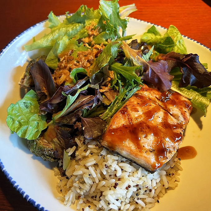 A bowl full of healthy indulgence: The Sesame Soy Salmon Bowl proves that "nutritious" and "delicious" aren't mutually exclusive. Your taste buds and your doctor will approve!