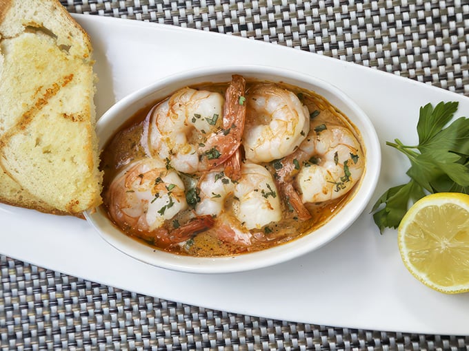 Shrimp scampi: Where garlic dreams come true. These little swimmers are doing the backstroke in a pool of buttery bliss.