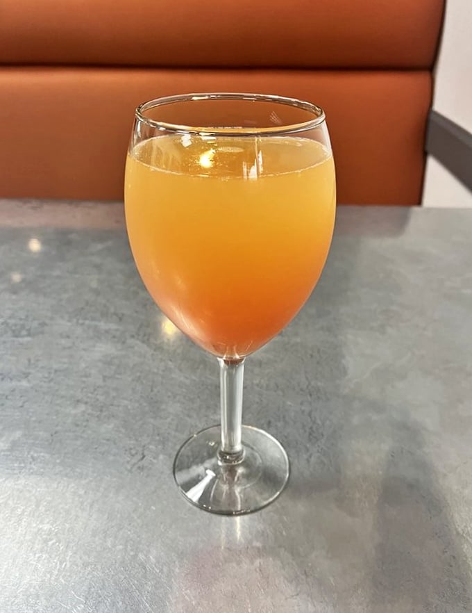 Sunshine in a glass? Close, but this Sunrise Mimosa might just outshine ol' Sol himself. Breakfast booze never looked so good!