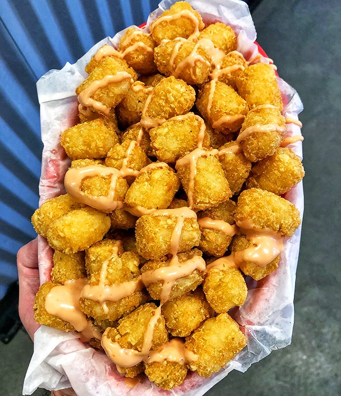 Tater tot heaven! These crispy nuggets of potato perfection are like edible nostalgia, taking you back to school lunch's greatest hits.