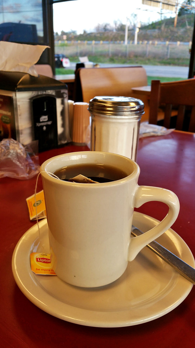 Ah, the humble cup of tea. It may not be the star of the show, but it's the quiet sidekick every hearty breakfast needs.