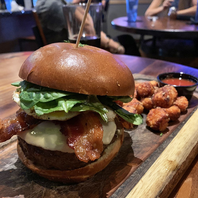 Wood you look at that beauty? The Teak Wood Burger is a flavor explosion waiting to happen, served with a side of pure joy.