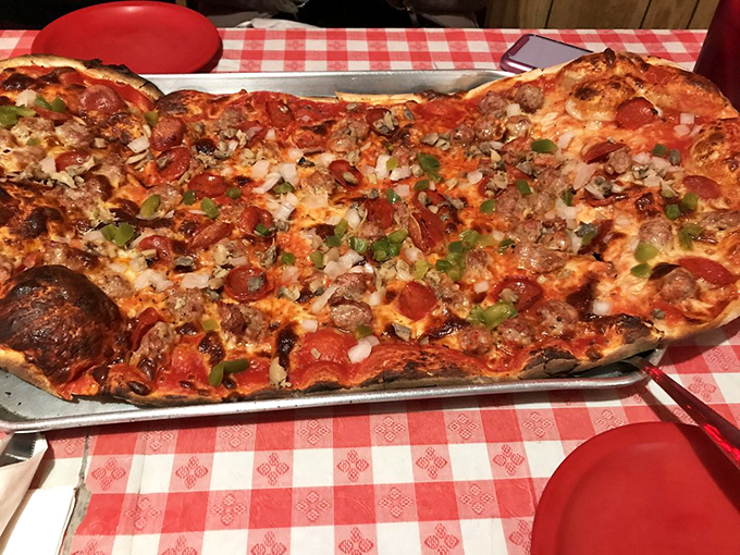 Meet "The Special" - a pizza so loaded with toppings, it's like a garden party and a meat feast had a delicious love child.