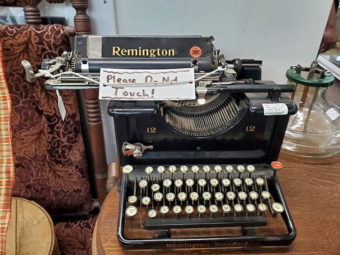 "Please Do Not Touch!" says the sign. But oh, how our fingers itch to tap out the next Great American Novel on this classic Remington!