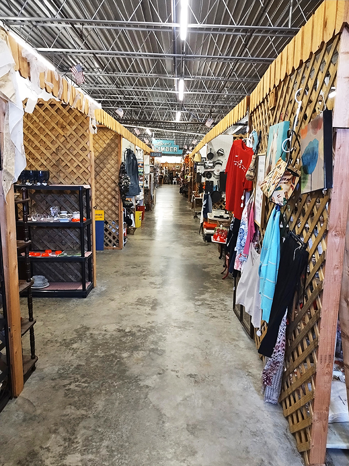 Down the rabbit hole we go! This aisle stretches on like a Lewis Carroll creation, each booth a new chapter in the flea market story.