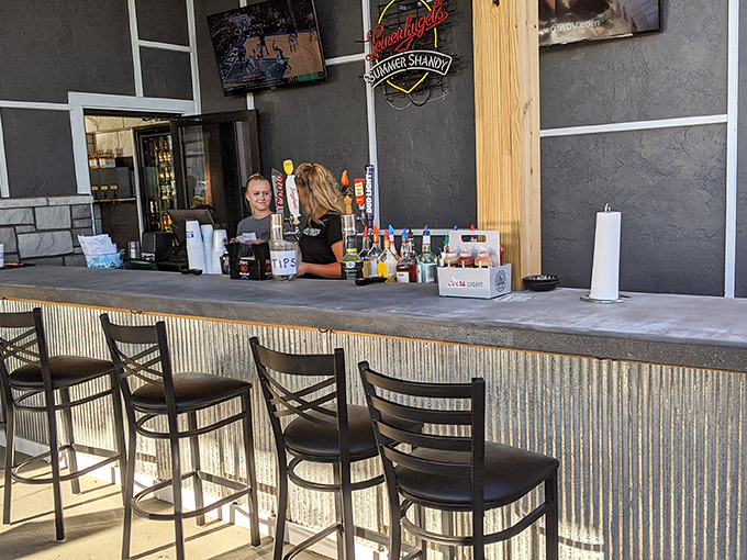 Belly up to barbecue bliss! This bar's not just serving drinks; it's pouring liquid happiness to complement your smoky feast.