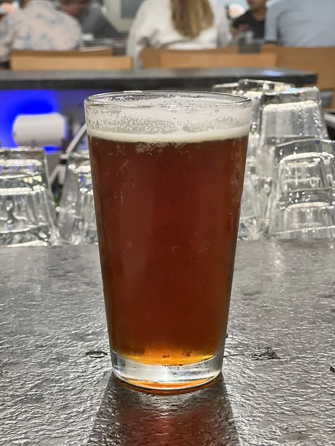 Ahoy, me hearties! This frosty brew is the perfect companion for your seafood feast. It's happiness in a glass, with a foamy mustache to boot!