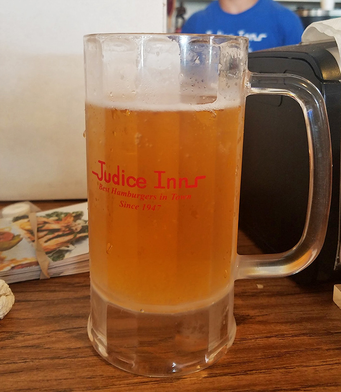 Cheers to tradition! This frosty mug of beer is the ideal companion for your burger - a match made in comfort food heaven.