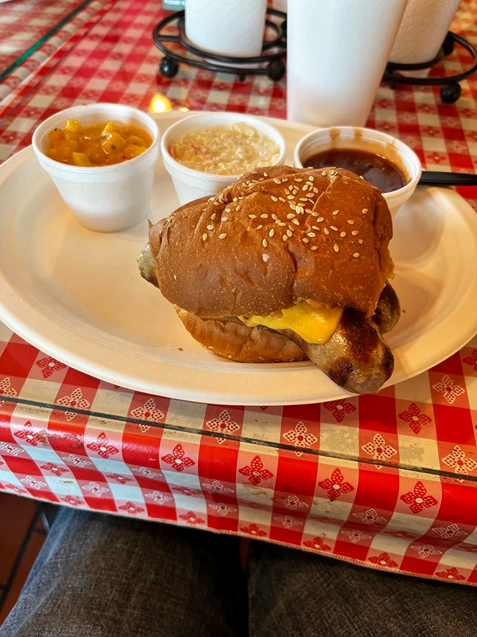 Cheesy does it! This brat sandwich is like a warm hug for your mouth, complete with all the fixin's that'll make your inner Wisconsinite proud.