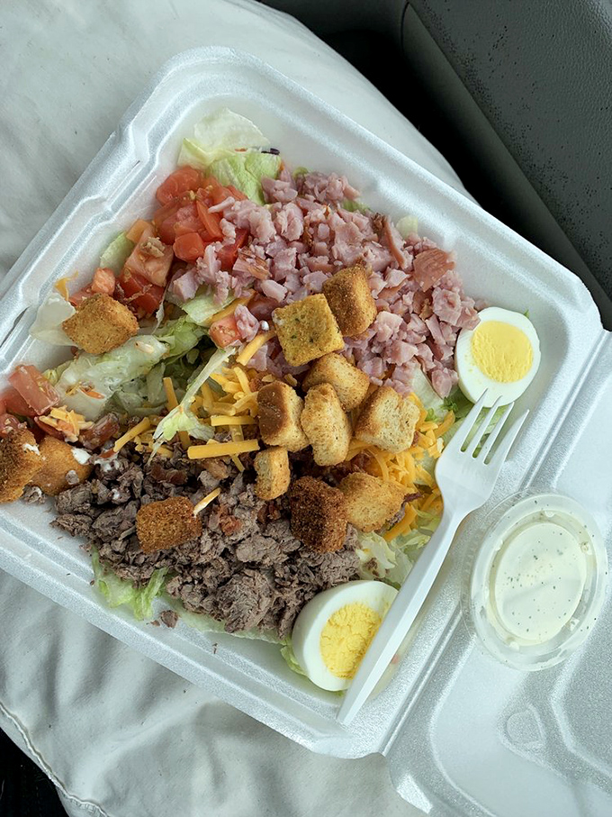 Salad that's ready for its close-up! This chef's creation is a blockbuster of flavors, starring crisp veggies and protein powerhouses.