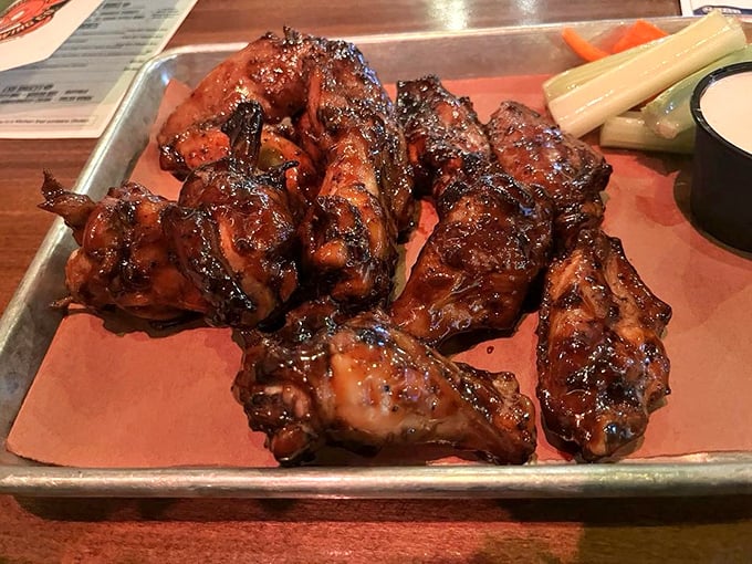 Wings that'll make you want to flap your arms with joy! These smoky, saucy delights are proof that chickens don't need to fly to reach flavor heaven.