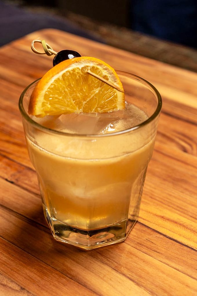 A cocktail that says "vacation" even on a Tuesday. That orange garnish isn't just decoration&mdash;it's a promise of good times ahead.