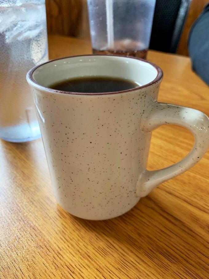 The elixir of life! This humble mug holds the key to conquering early mornings and powering through long days. Coffee: because adulting is hard.