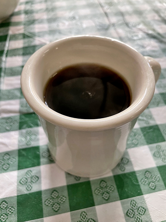 Liquid motivation in a mug! This coffee looks dark enough to wake the dead, yet smooth enough to make mornings bearable. Caffeine lovers, meet your new best friend.