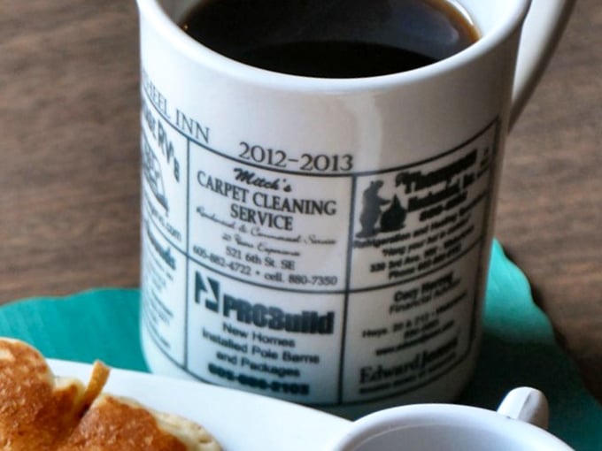 This isn't just any old cup of joe. It's a time machine in a mug, transporting you back to simpler days of local gossip and endless refills.